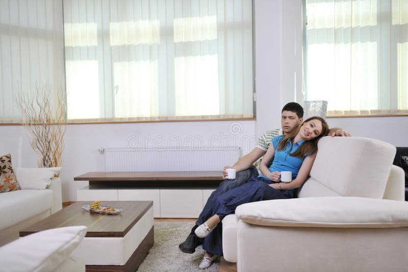 Couple Relax at Home on Sofa in Living Room Stock Image - Image of ...