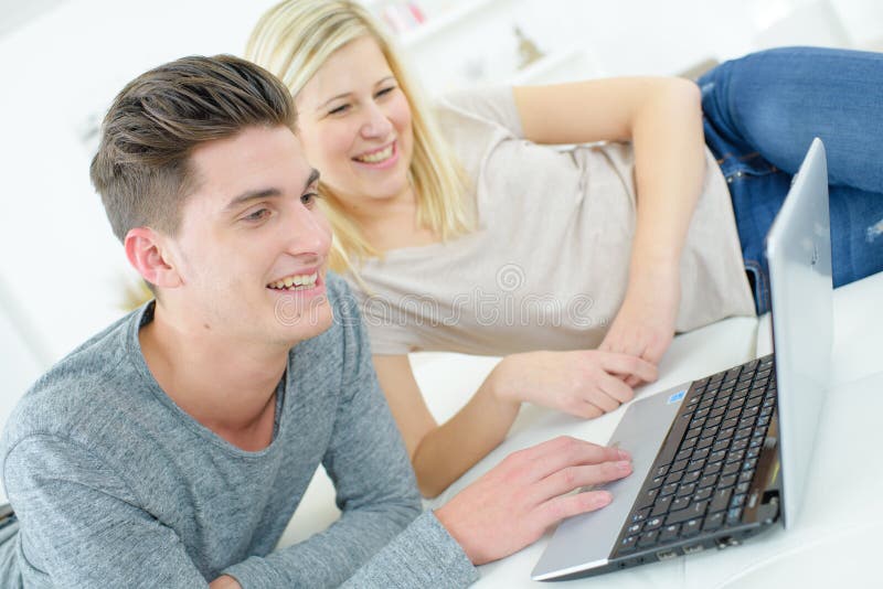 Couple Relaxing in Front Their Computer Stock Image - Image of good ...