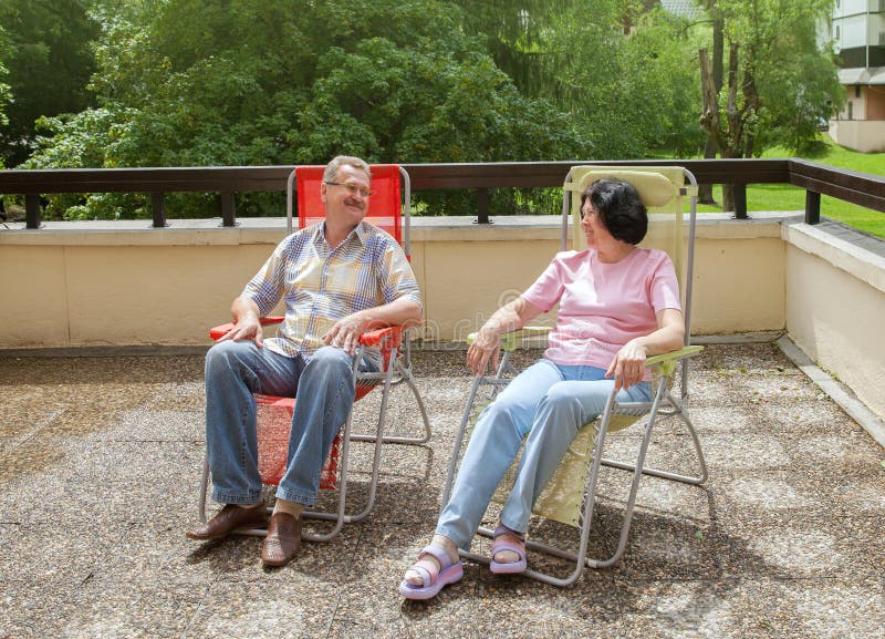 The Couple Rest in Lounge on Terrace Stock Photo - Image of lounge ...