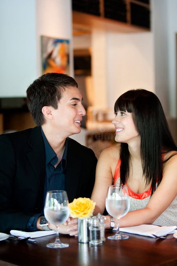 Couple in Restaurant stock image. Image of dating, people - 11430507