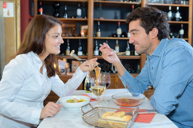 Couple in restaurant stock image. Image of specialty - 296370045