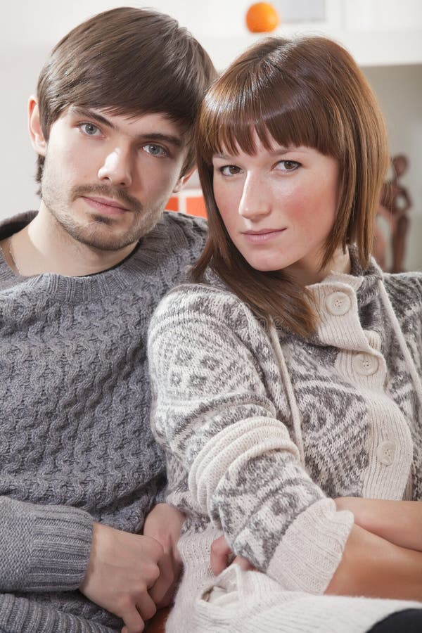 Couple resting at home stock image. Image of looking - 17540769