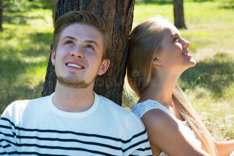 Couple Resting Under a Tree Stock Image - Image of happy, adult: 109999207