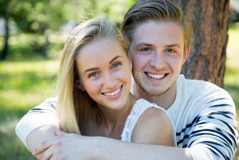 Couple Resting Under a Tree Stock Image - Image of beauty, handsome ...