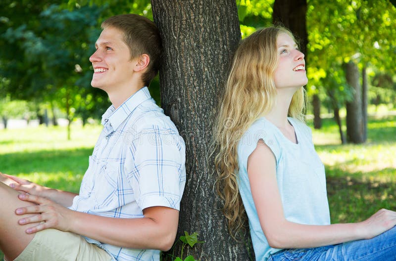 Couple Resting Under a Tree Stock Photo - Image of portrait, beauty ...