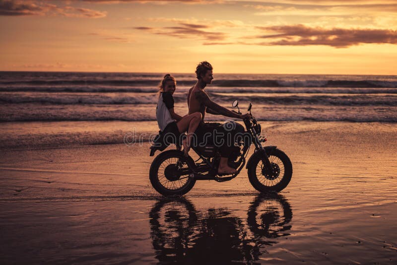 Couple Riding Motorcycle on Ocean Stock Image - Image of affectionate ...
