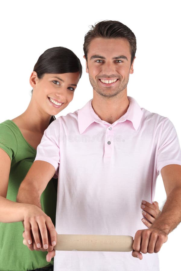 Couple with a rolling pin stock image. Image of couple - 25670645