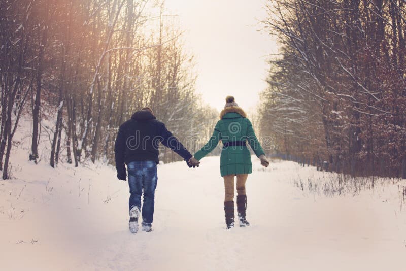 Young Couple with Dog Walking in the Winter Forest Stock Image - Image ...