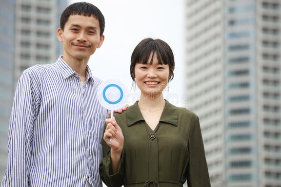 A couple with a round bill stock image. Image of family - 238933449