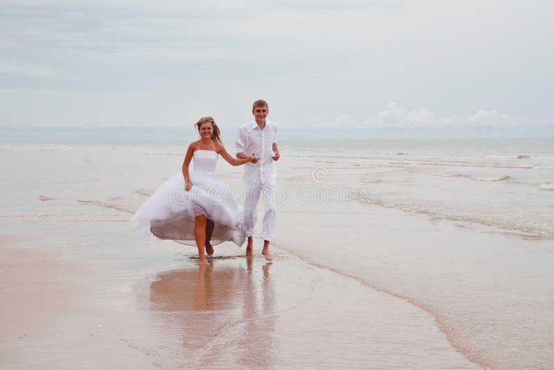 Newly Wedding Couple in Love on a Beach Stock Image - Image of loving ...