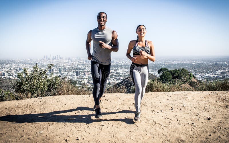 Couple Running in Los Angeles Stock Photo - Image of mixed, afro: 90290800