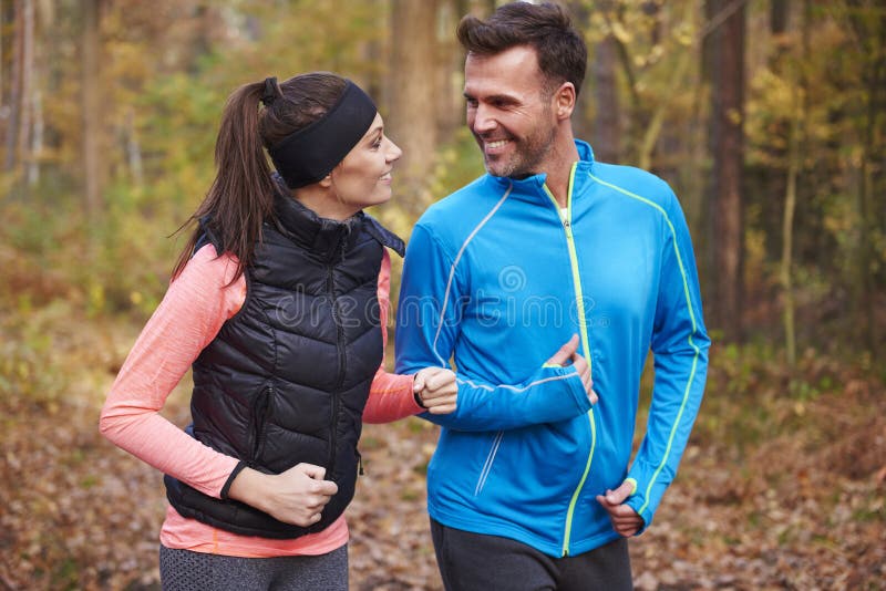 Couple running stock image. Image of gesturing, cheerful - 61895979