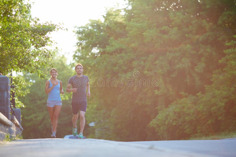 Couple running stock image. Image of boyfriend, outdoors - 58243733