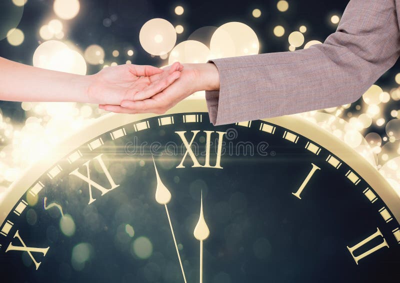 Couple`s Hands Holding Over Magical Time Clock with Sparkles Stock ...