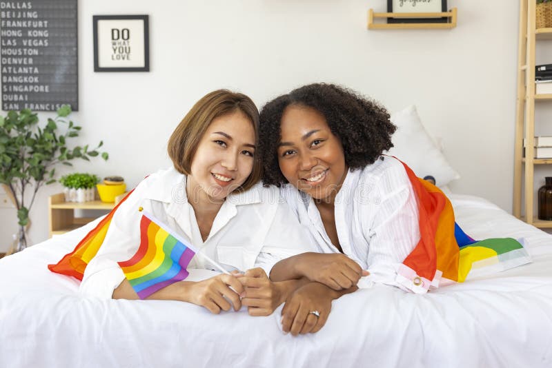 Couple Of Same Sex Marriage From Difference Races Holding Lgbtq Rainbow