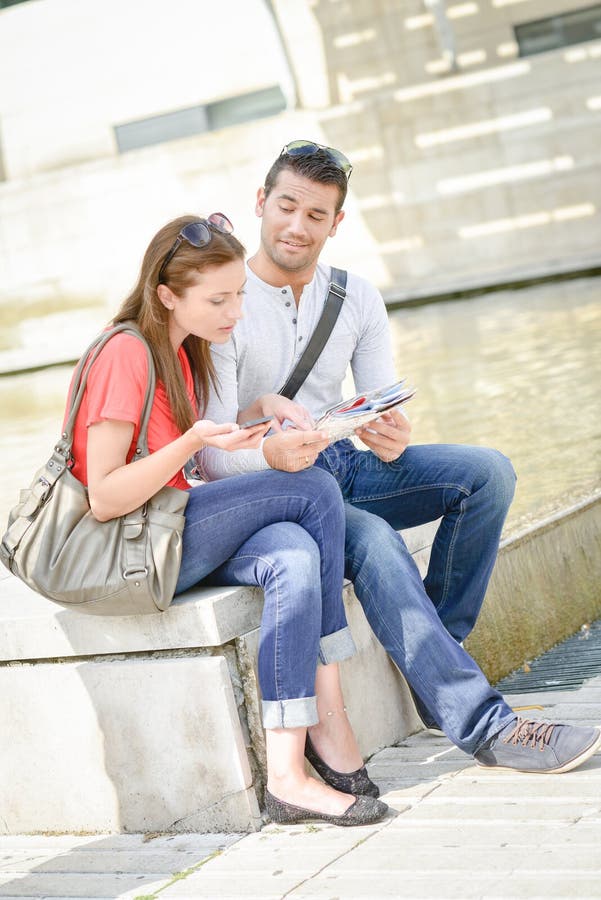 Couple sat down in city stock image. Image of holiday - 74870855