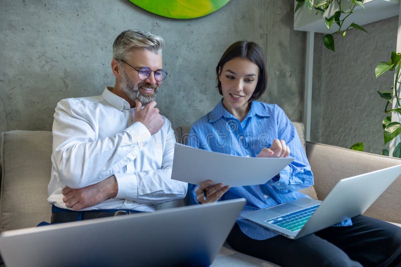 Couple Scrutinizing a Marriage Agreement and Looking Involved Stock ...