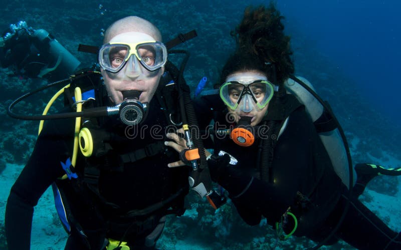 Couple scuba diving stock image. Image of activity, colourful - 15220179