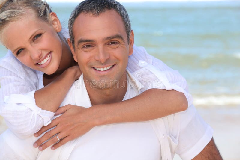 Couple by the sea stock photo. Image of dark, 3540, smiling - 26505308