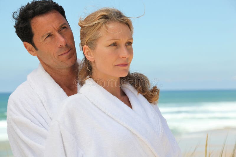 Couple by the sea stock photo. Image of ocean, blond - 28905726