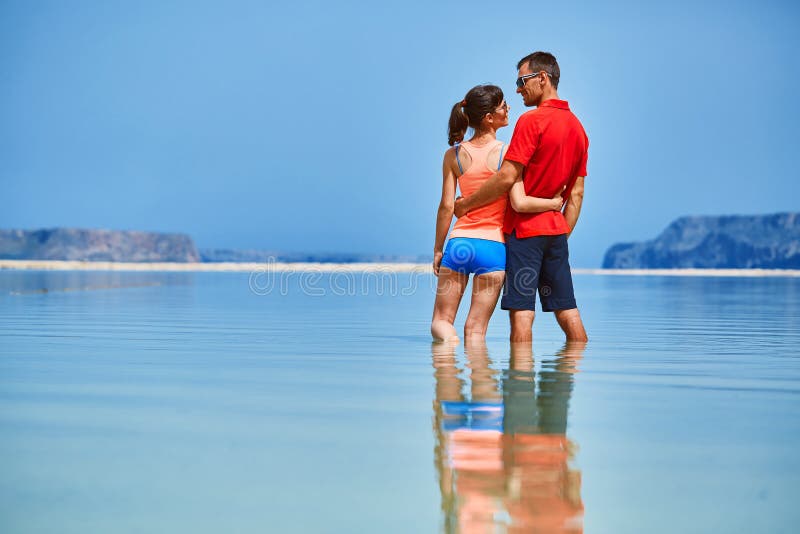 Couple in the sea stock image. Image of clothing, boat - 70756789