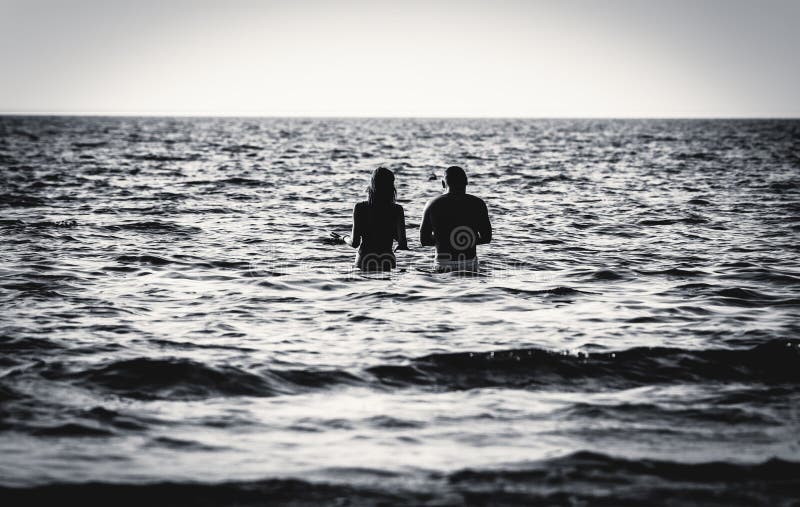 Bathing couple stock image. Image of shade, recreation - 204109987