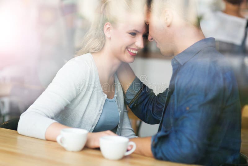 Couple Seen through Cafe Window Stock Photo - Image of meeting, cafe ...