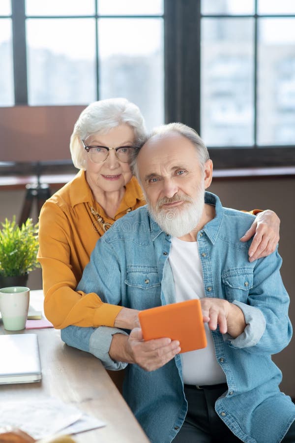 Couple of Seniors Surfing the Internet Using a Tablet Stock Image ...
