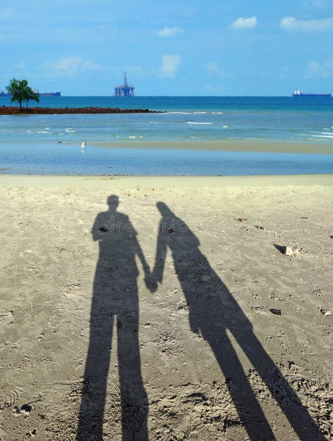 Couple Shadows Holding Hands at Sandy Beach Stock Photo - Image of ...