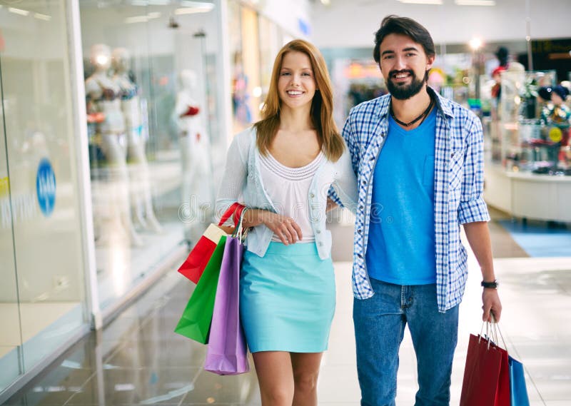 Couple of shopaholics stock image. Image of husband, looking - 32730489