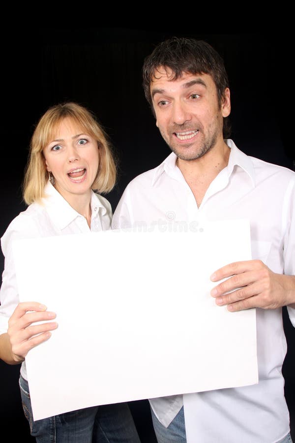Couple with sign stock image. Image of expression, emotional - 7539851