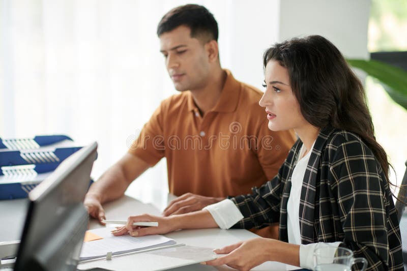 Couple Signing Documents stock photo. Image of brainstorming - 271455782