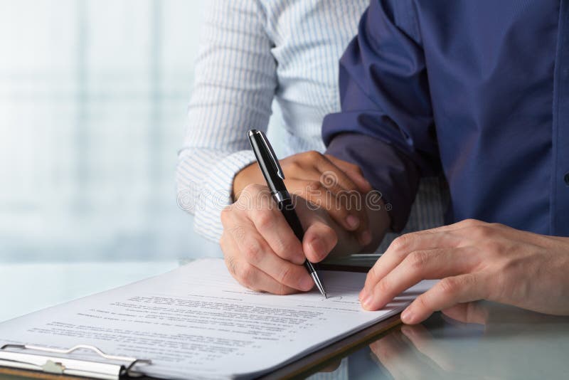 Couple Signing Sales Contract at Car Dealer Stock Image - Image of ...