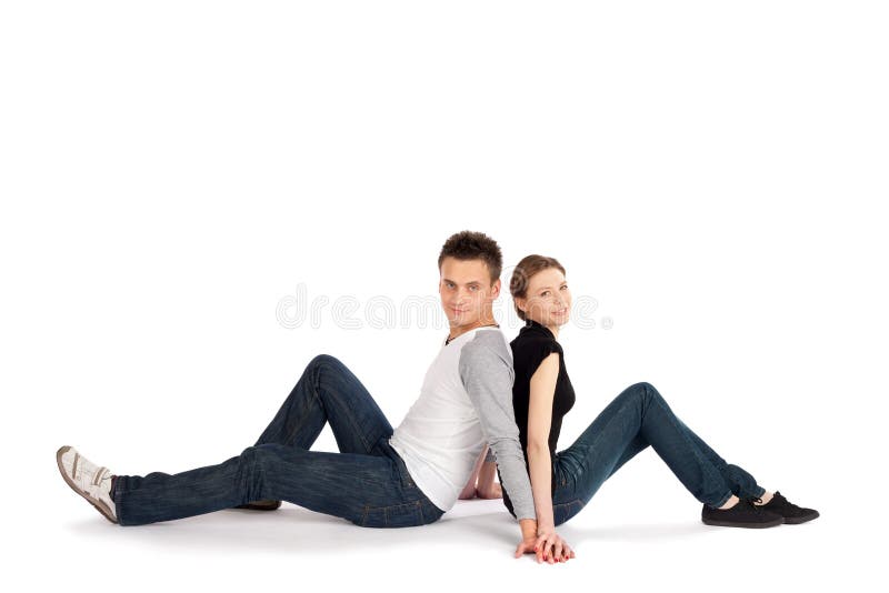 Guy and Girl Sitting Back To Back Stock Photo - Image of pair, adult ...