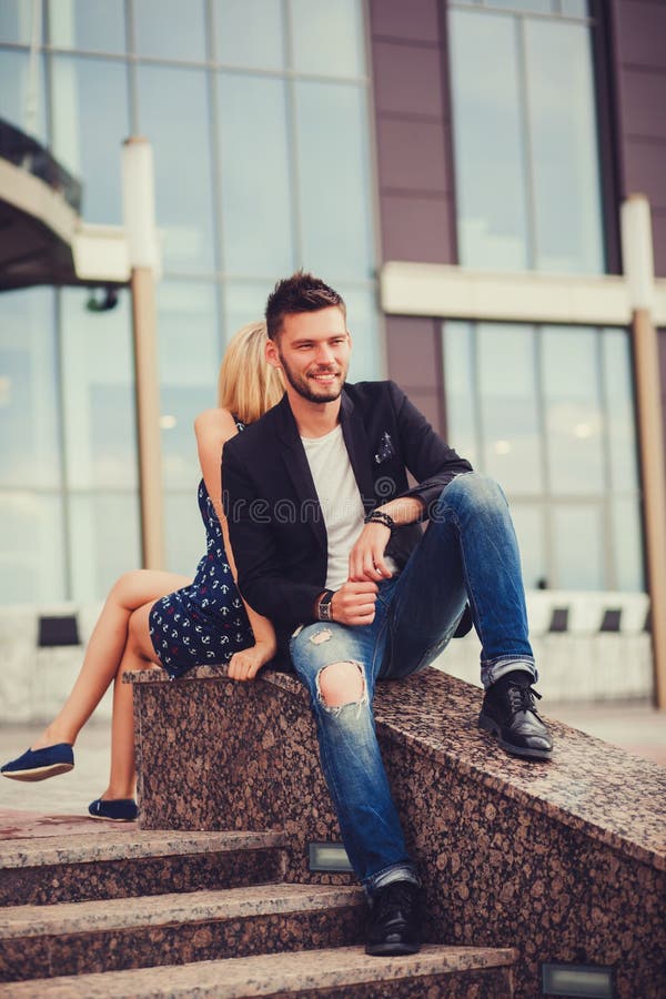 Couple Sitting Back To Back Stock Photo - Image of person, happy: 80167398