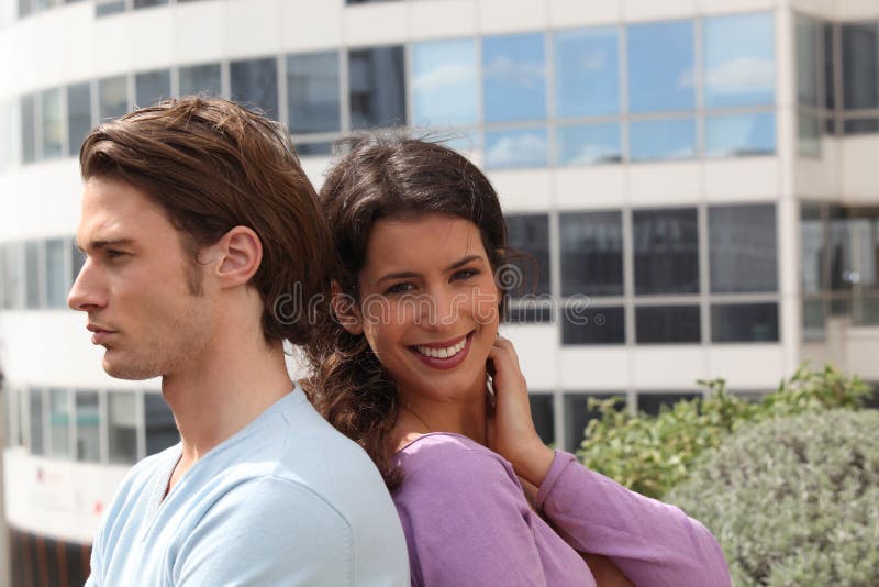 Couple Sitting Back To Back Stock Image - Image of iciness, couple ...