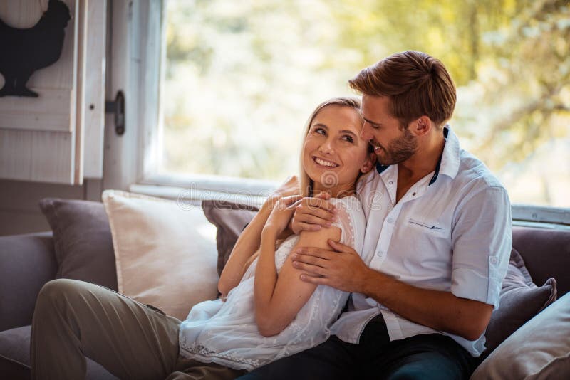 Couple sitting in hug. stock photo. Image of girl, female - 216307950