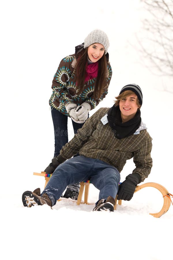 Young Happy Couple Sledding in Winter Stock Image - Image of laugh ...