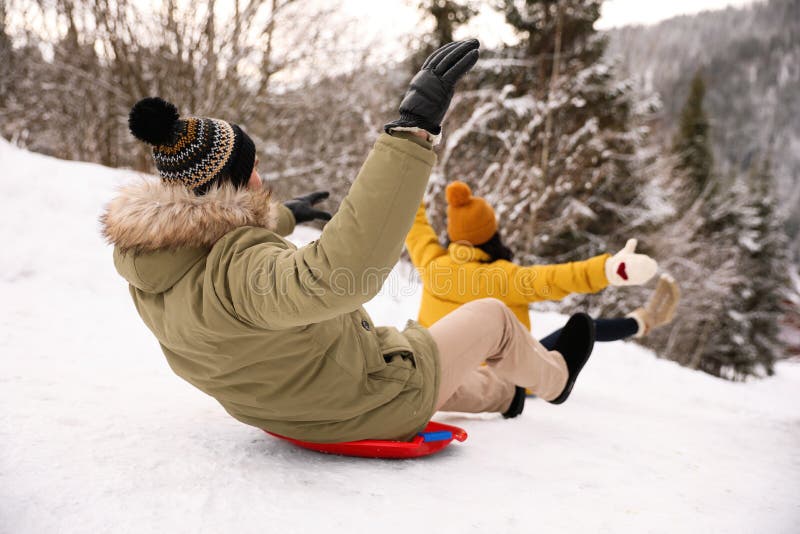 Couple Sliding on Hill. Winter Vacation Stock Image - Image of ...