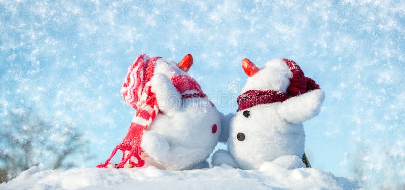 Couple of snowmen stock photo. Image of closeup, snow - 104402768