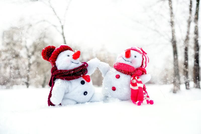 Couple of snowmen stock image. Image of handmade, snow - 80133475