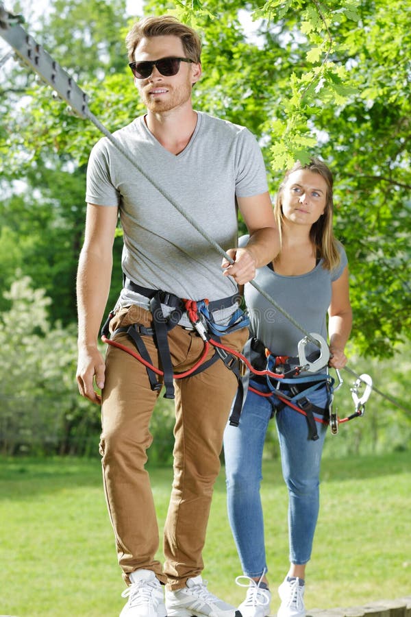 Couple Spend Their Leisure Time in Ropes Course Stock Photo - Image of ...