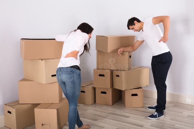 Couple Standing with Cardboard Boxes Stock Photo - Image of people ...