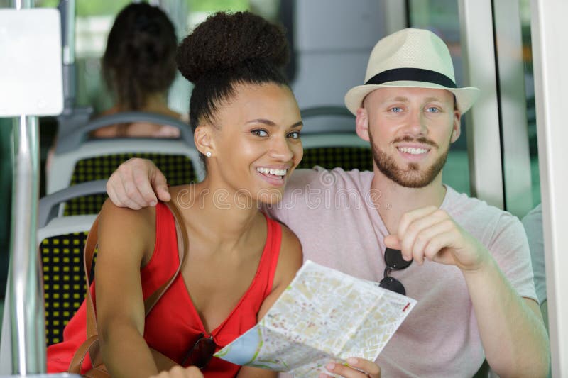 Couple Standing in City Bus Stock Photo - Image of touristic, persons ...