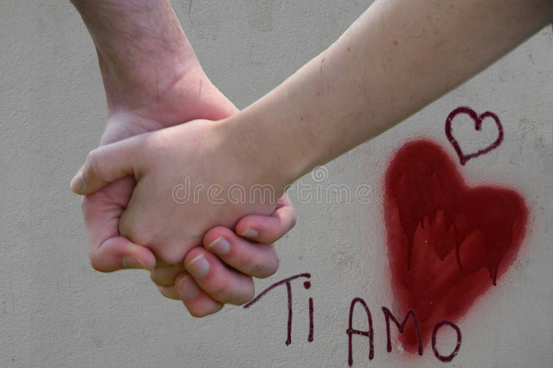 Couple in Love Goes Hand in Hand Stock Photo - Image of outdoor, shine ...