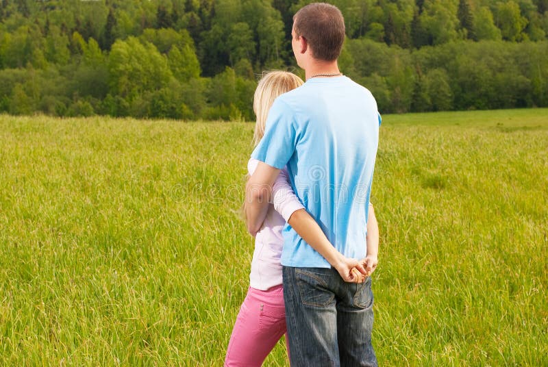 Couple Standing and Hugging in Nature Stock Photo - Image of rear ...