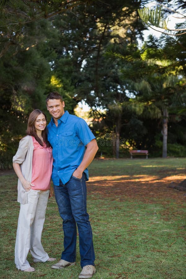 Couple Standing in the Shade Stock Photo - Image of portrait, parkland ...