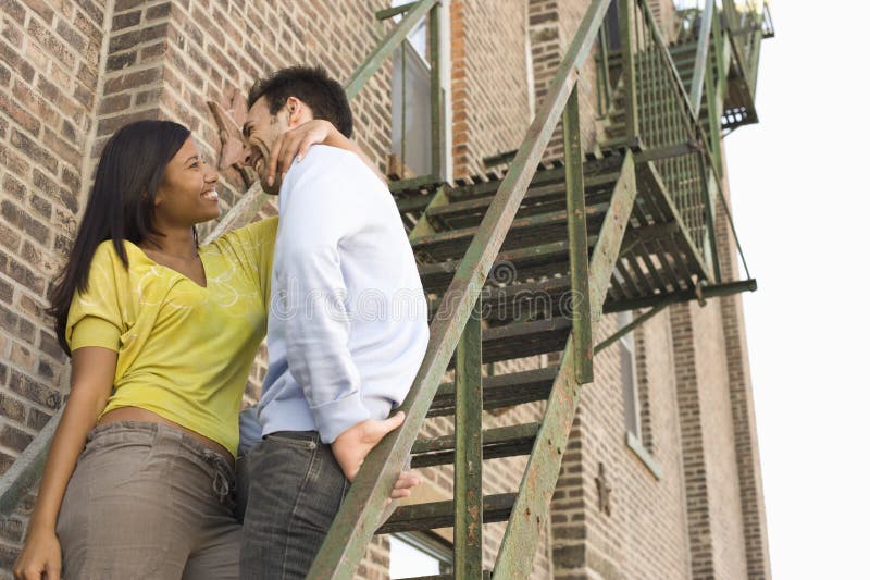 Couple Standing Together on Steps Stock Photo - Image of middle, angle ...