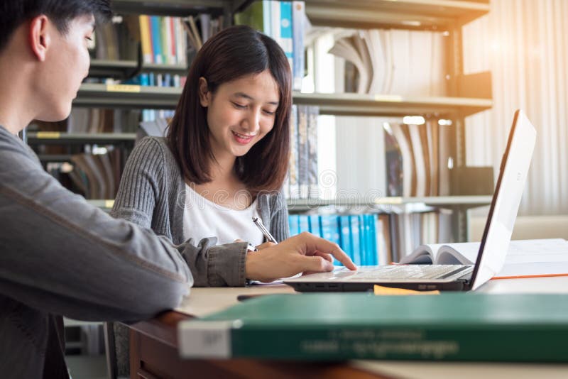 Couple of Students Studying Together at Library Stock Photo - Image of ...
