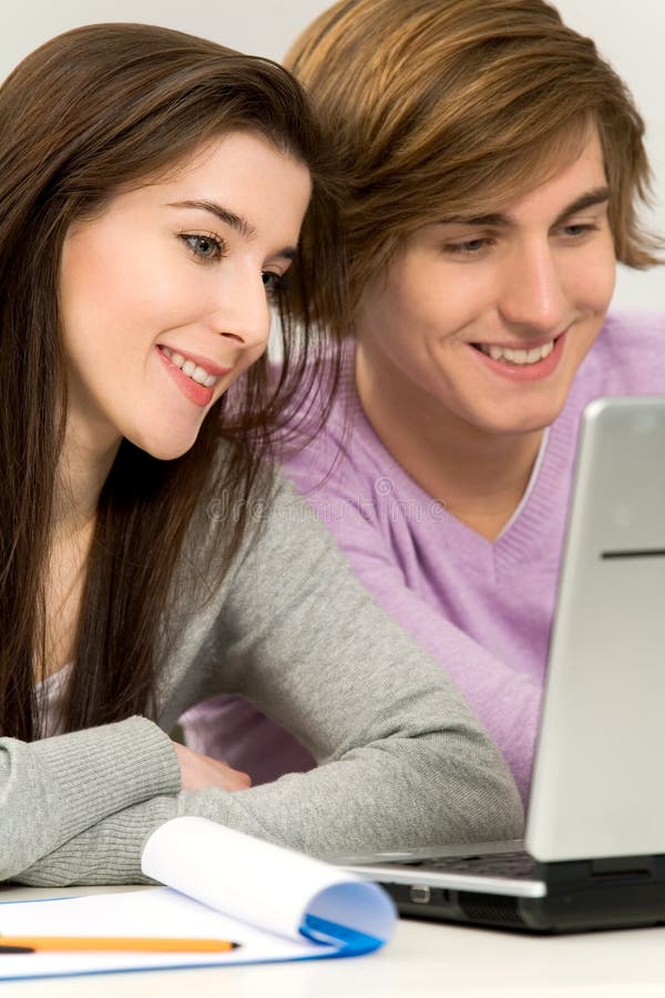Couple studying stock photo. Image of pillows, cheerful - 12830742